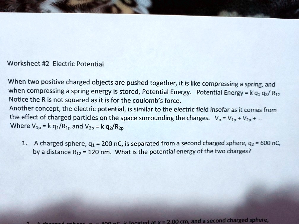 SOLVED: Worksheet #2 Electric Potential When two positive charged ...