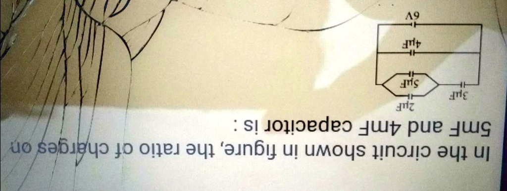 SOLVED: In the circuit shown in the figure, the ratio of charges on the ...