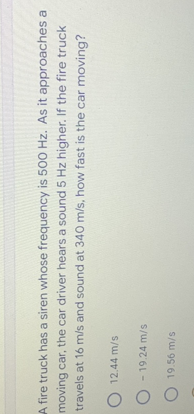 A fire truck has a siren whose frequency is 500 Hz. As it approaches a ...