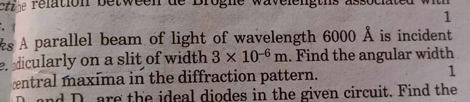 SOLVED: 1 As a parallel beam of light of wavelength 6000 Å is incident ...