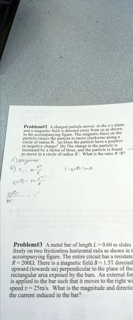 problem 2 a charged particle moves in the x y plane and a magnetic field is directed away from ...