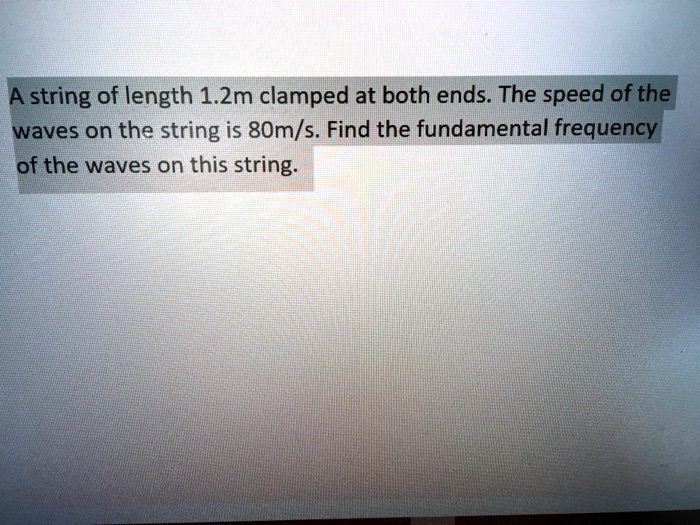 A string of length 1.2m clamped at both ends. The speed of the waves on ...