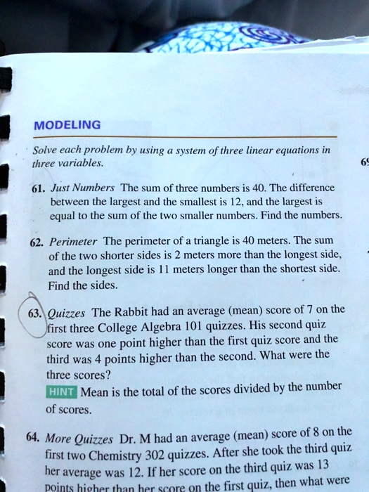 SOLVED: MODELING Solve each problem by using system of three linear ...