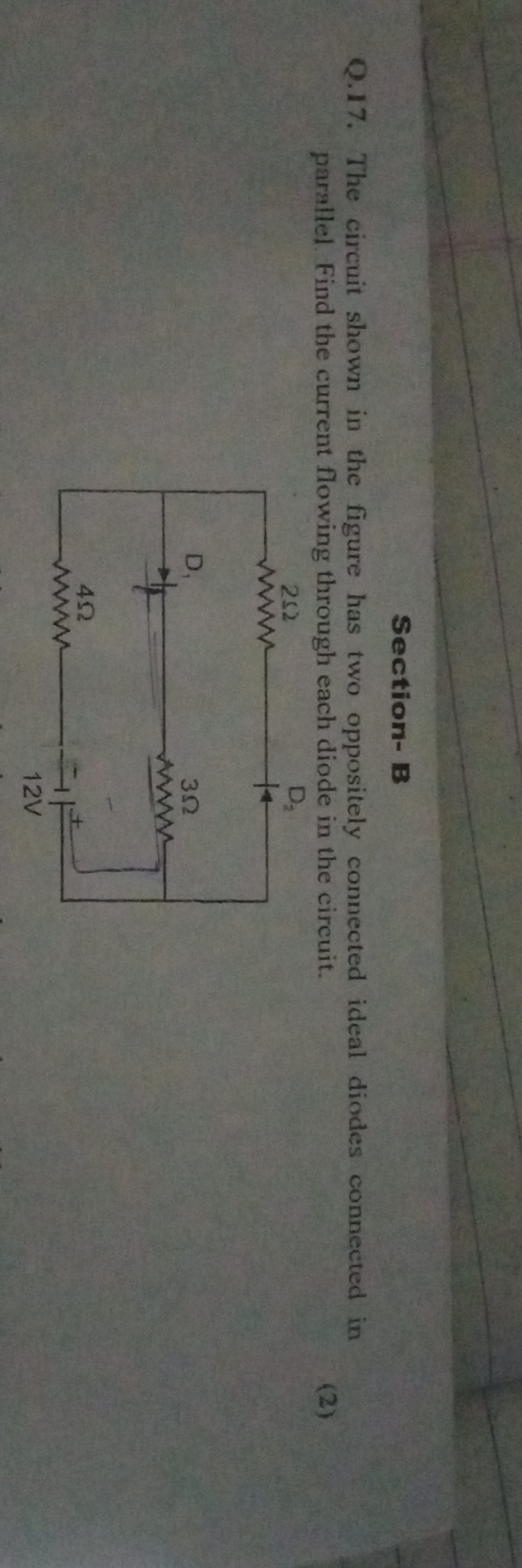 Section- B Q.17. The circuit shown in the figure has two oppositely connected ideal diodes ...