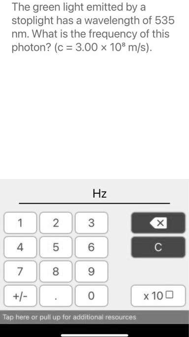 The green light emitted by a stoplight has a wavelength of 535 nm. What ...