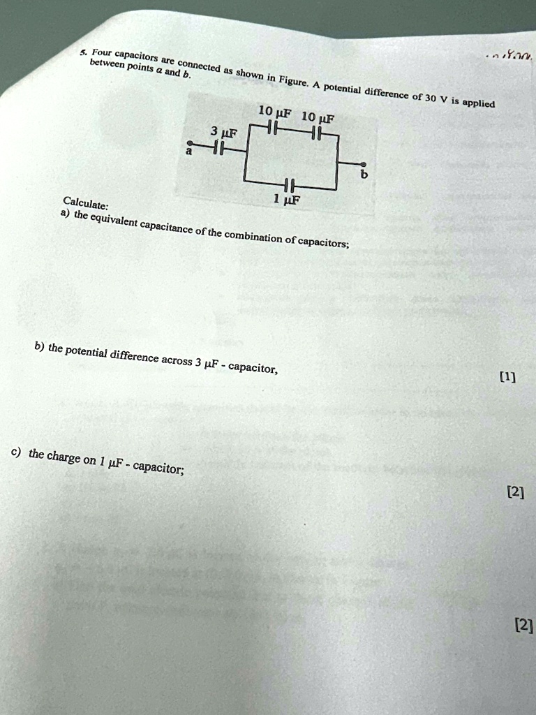 5. Four capacitors are connected as shown in Figure. A potential ...