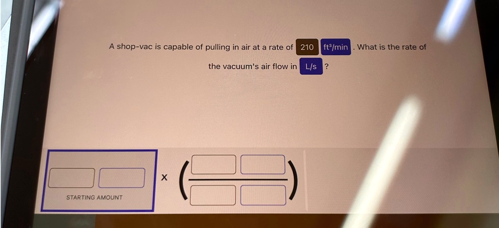 A shop-vac is capable of pulling in air at a rate of 210...