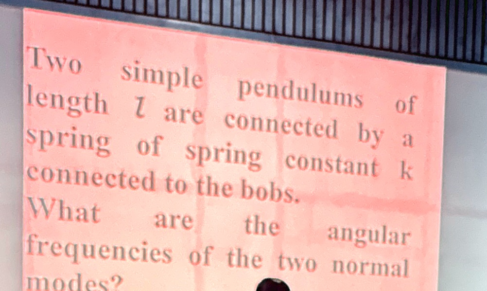 two simple pendulums of length l are connected by a spring of spring ...