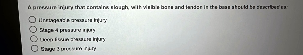 a pressure injury that contains slough with visible bone and tendon in ...