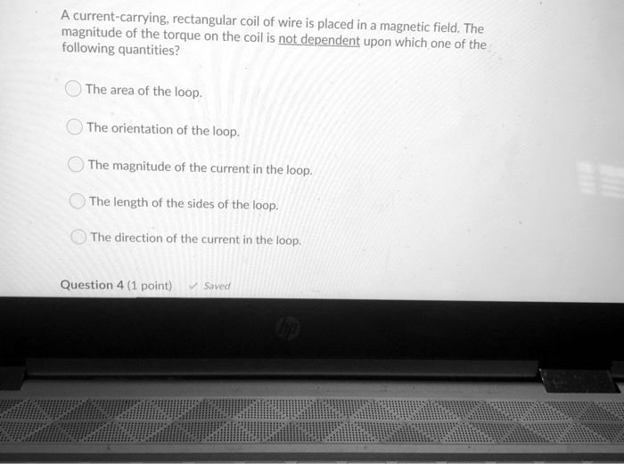 SOLVED: A current-carrying, rectangular coil of wire is placed in a ...