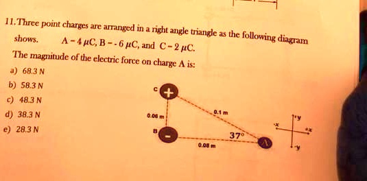 11three point charges are arranged in a right angle triangle as the ...