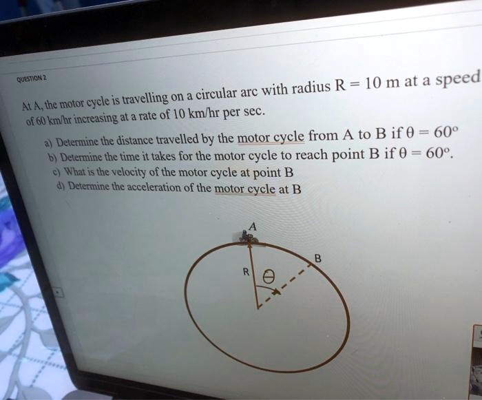 SOLVED: At A, the motorcycle is traveling on a circular arc with radius ...
