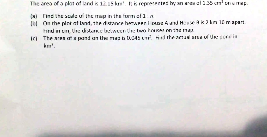 SOLVED: The area of a plot of land is 12.15 km?. It is represented by ...