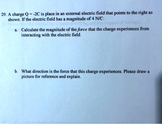 SOLVED: 29. charge Q = -2C is place in an external electric field that ...