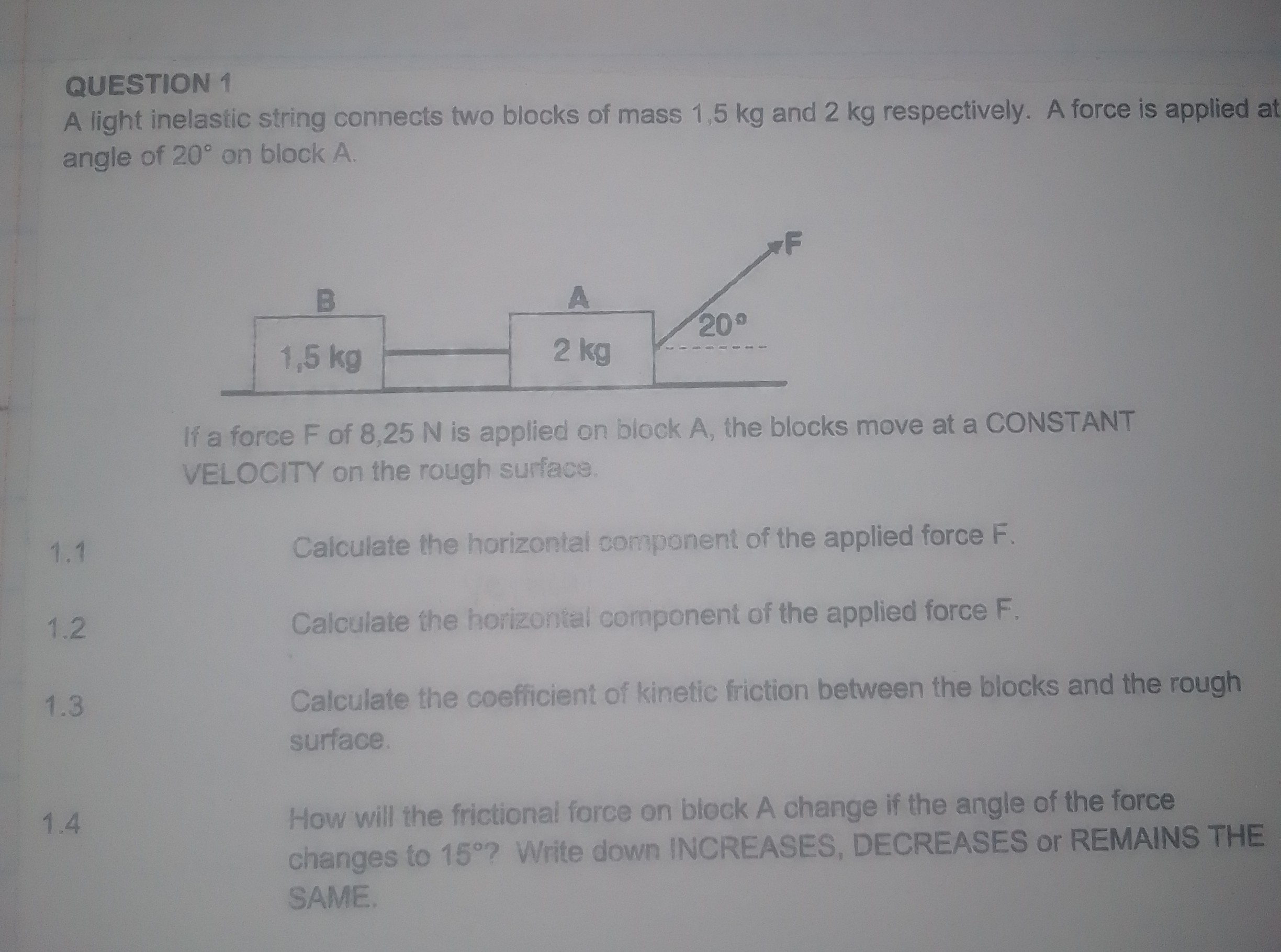 QUESTION 1 A light inelastic string connects two blocks of mass 1,5 kg ...