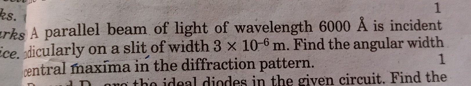 SOLVED: ks. rks A parallel beam of light of wavelength 6000 Å is ...