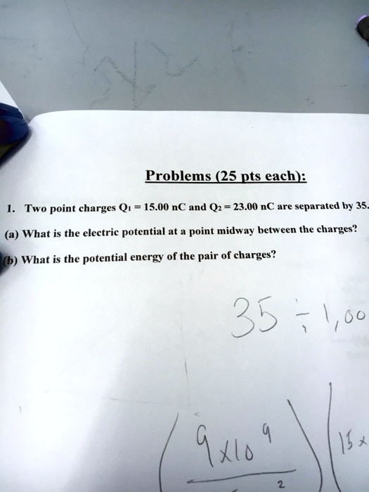 SOLVED: Two point charges Q = 15.00 nC and Q2 = 23.00 nC are separated ...