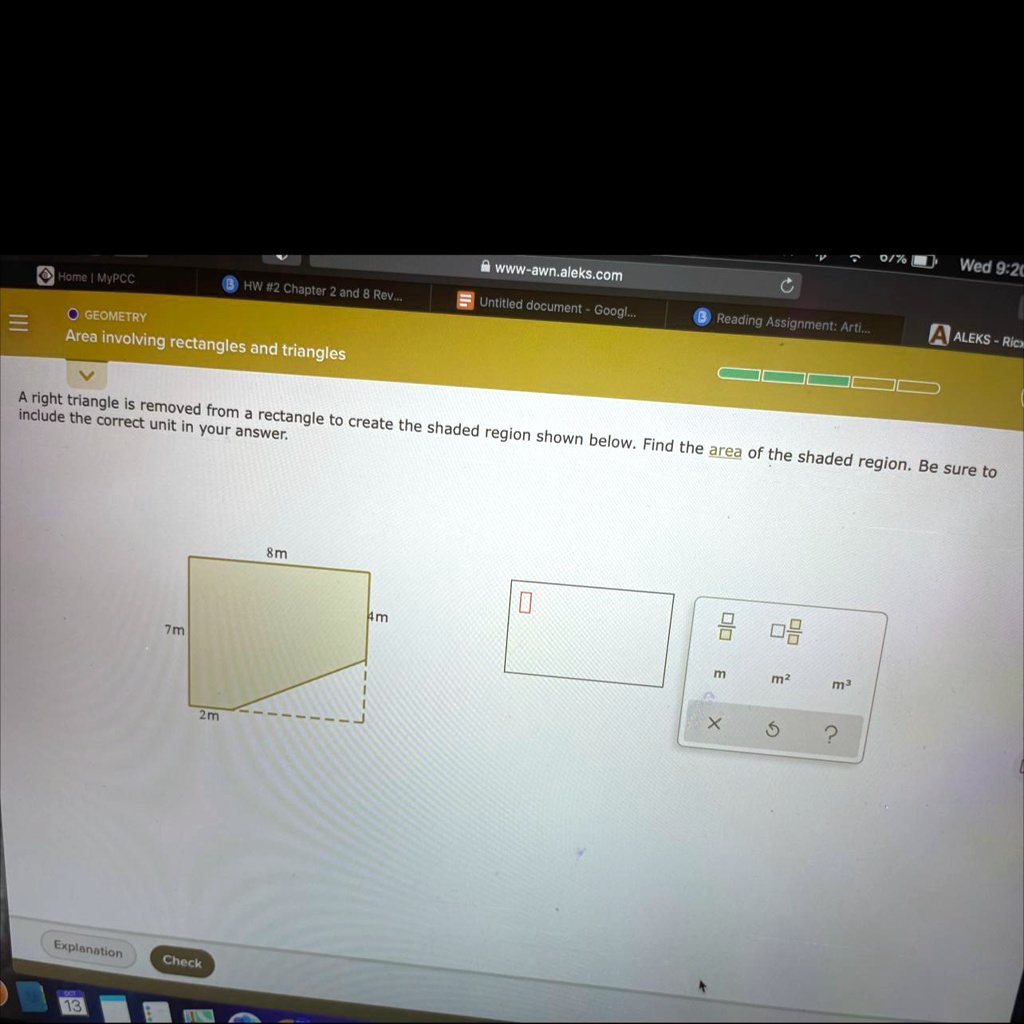 A right triangle is removed from a rectangle to create the shaded region shown below. Find the ...