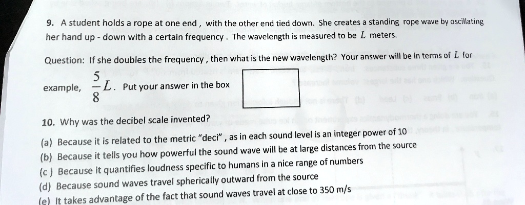 9. A student holds a rope at one end, with the other end tied down. She ...