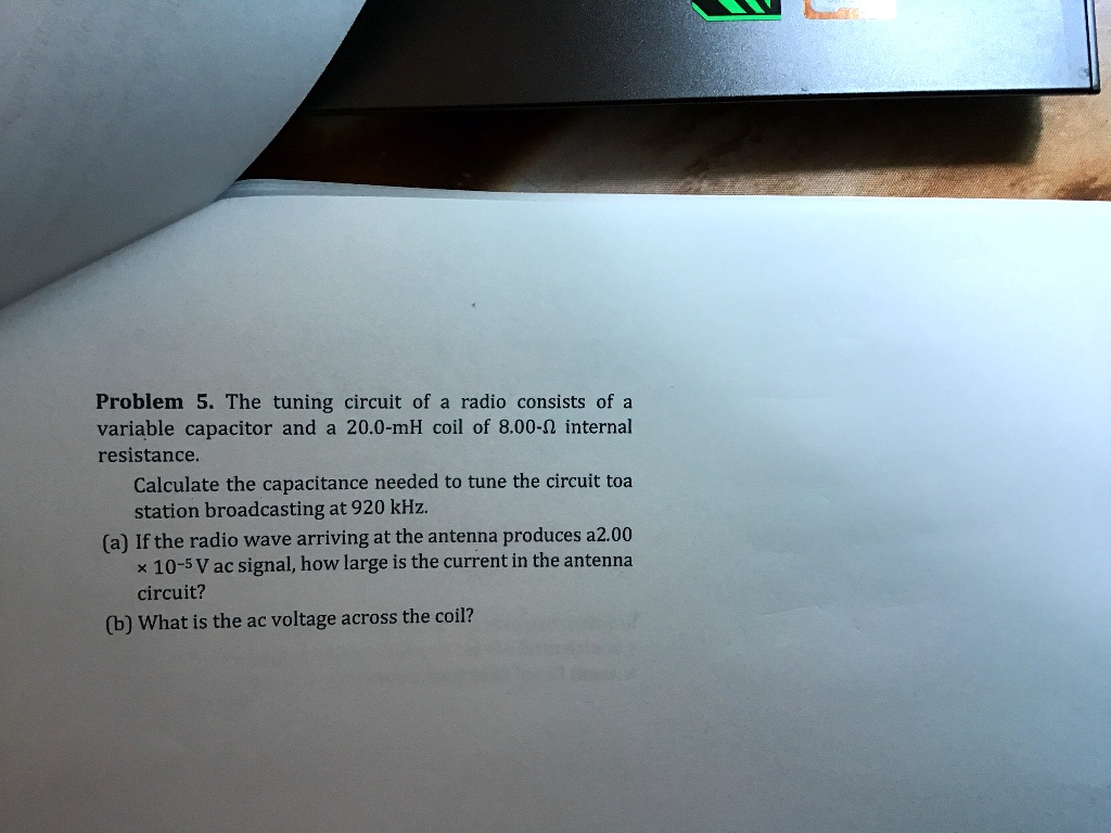 Problem 5. The tuning circuit of a radio consists of a variable capacitor and a 20.0-mH coil of ...