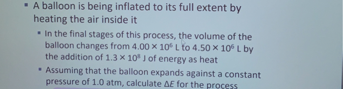 - A balloon is being inflated to its full extent by heating the air ...