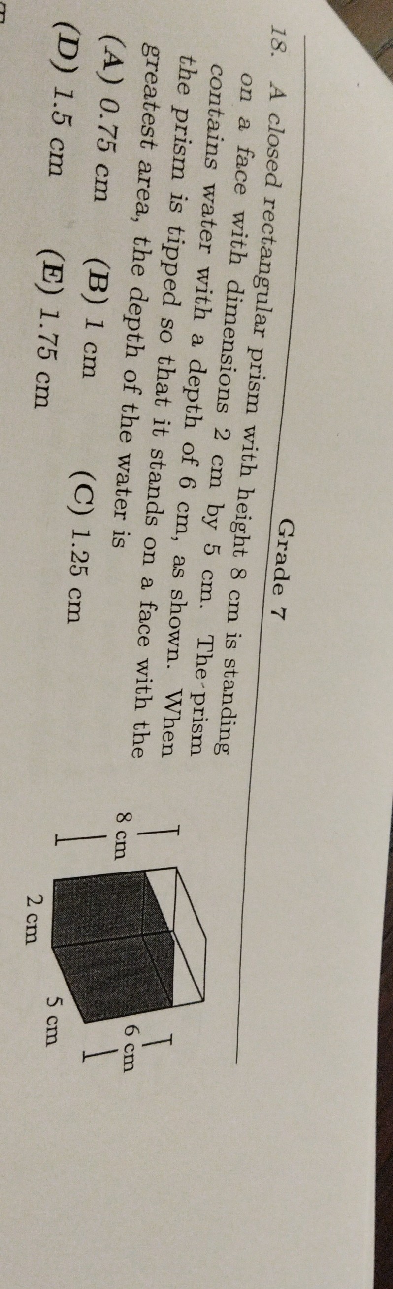 Grade 7 18. A closed rectangular prism with height 8 cm is standing on ...