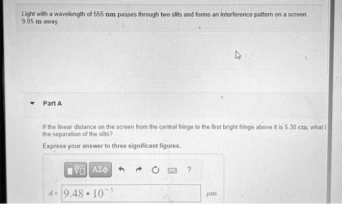 Light with a wavelength of 555 nm passes through two slits and forms an ...