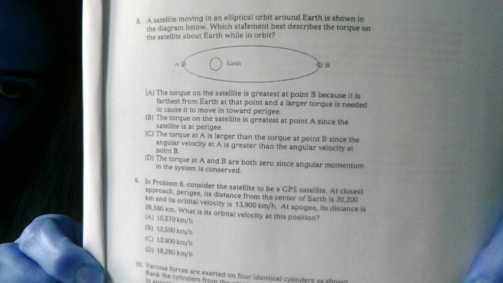 SOLVED: At a playground, a 60 kg student stands on the outer rim of a merry-go-round that has a ...