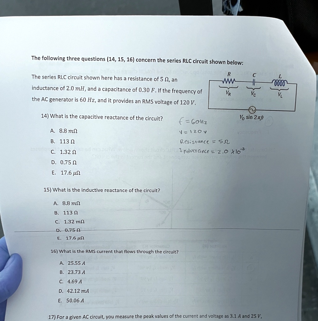 the following three questions 14 15 16 concern the series rlc circuit ...