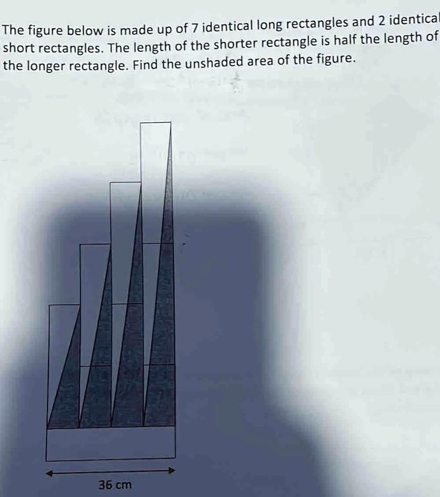 The figure below is made up of 7 identical long rectangles and 2 ...