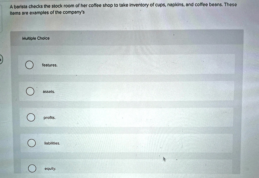 A barista checks the stock room of her coffee shop to take inventory of ...