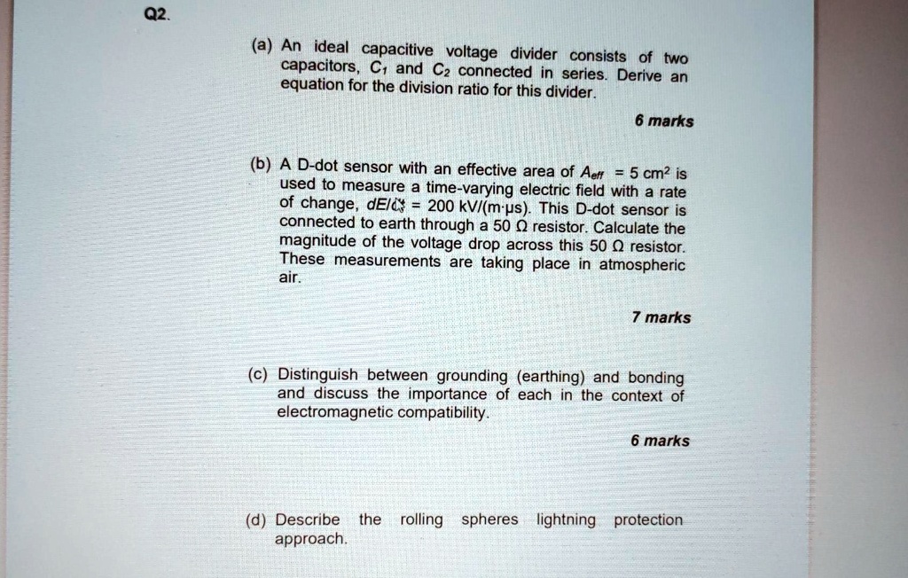 Q2. (a) An ideal capacitive voltage divider consists of two capacitors ...