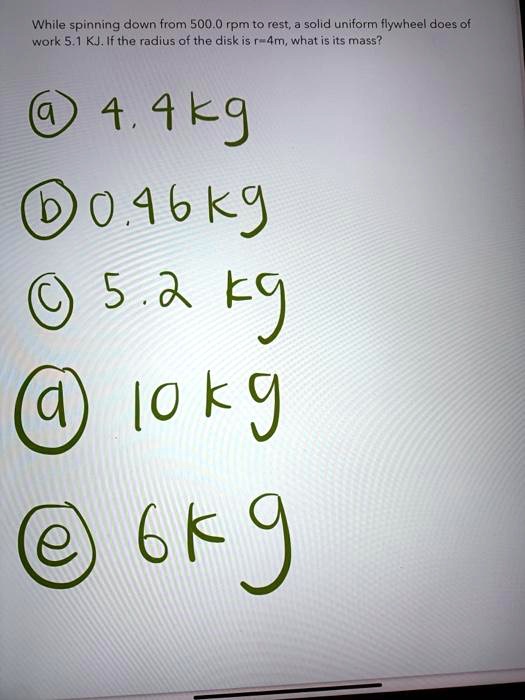 While spinning down from 500.0 rpm to rest, a solid uniform flywheel ...
