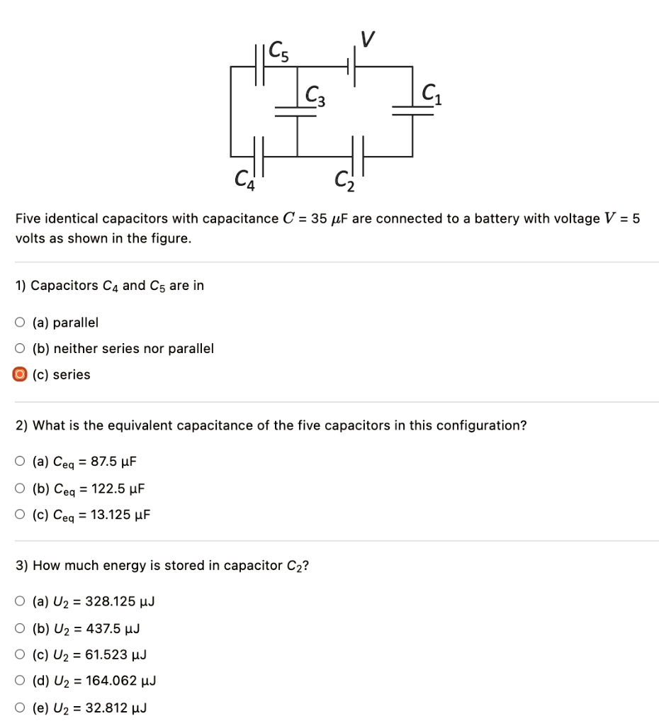SOLVED: Five identical capacitors with capacitance C = 35 pF are connected to a battery with ...