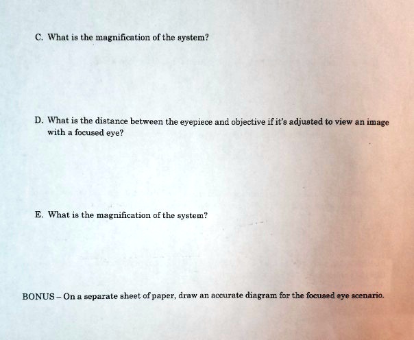 SOLVED:What is the magnilication of the system? Whhat the distance ...