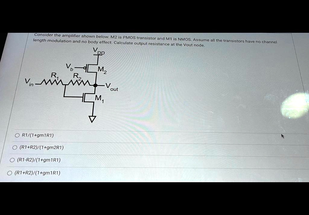 Consider the amplifier shown below. M2 is a PMOS transistor and M1 is an NMOS transistor. Assume ...