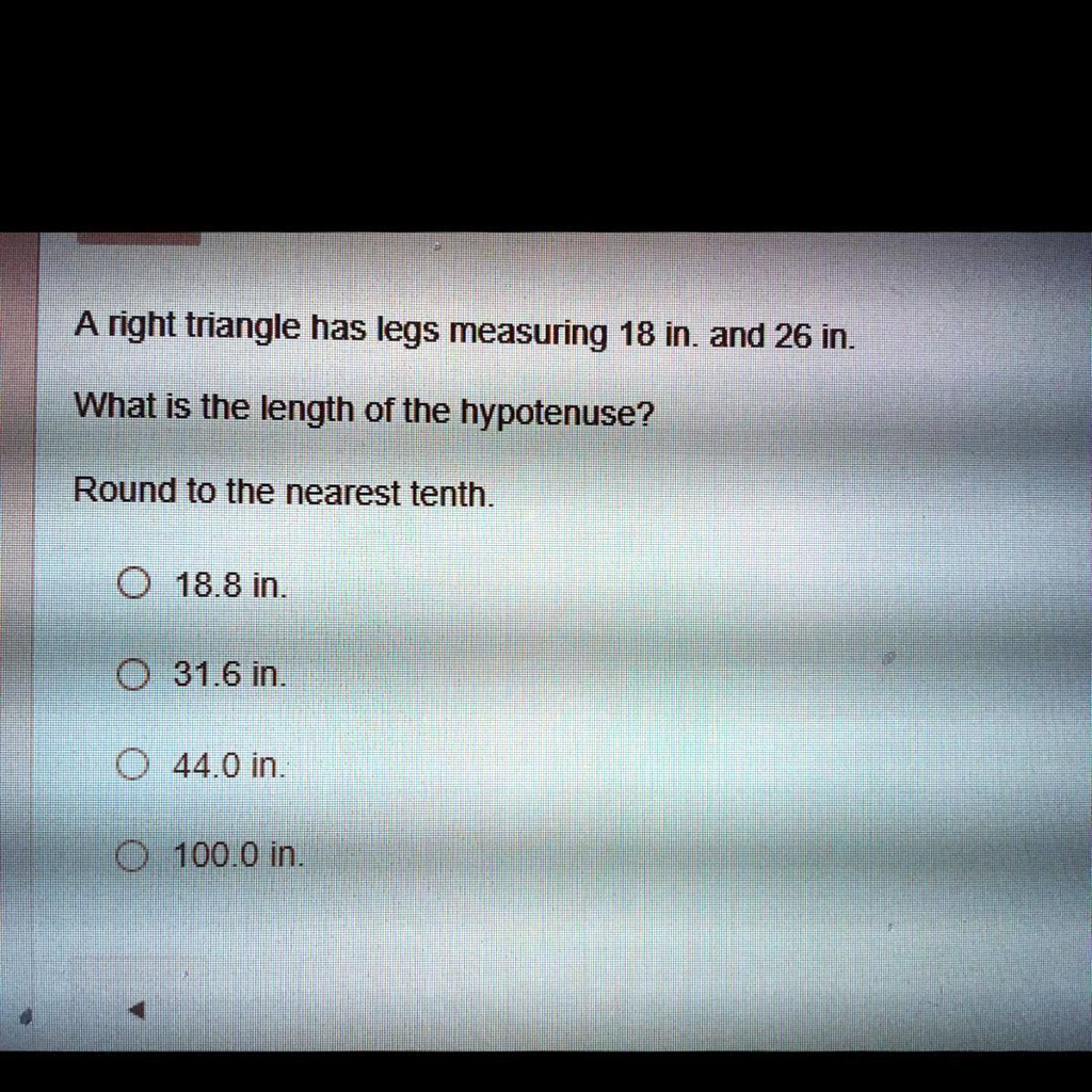 SOLVED: A right triangle has legs measuring 18 inches and 26 inches ...