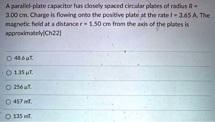 parallel plate capacitor has closely spaced circular plates of radius r ...
