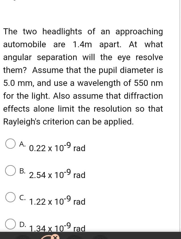 SOLVED: The two headlights of an approaching automobile are 1.4 m apart. At what angular ...