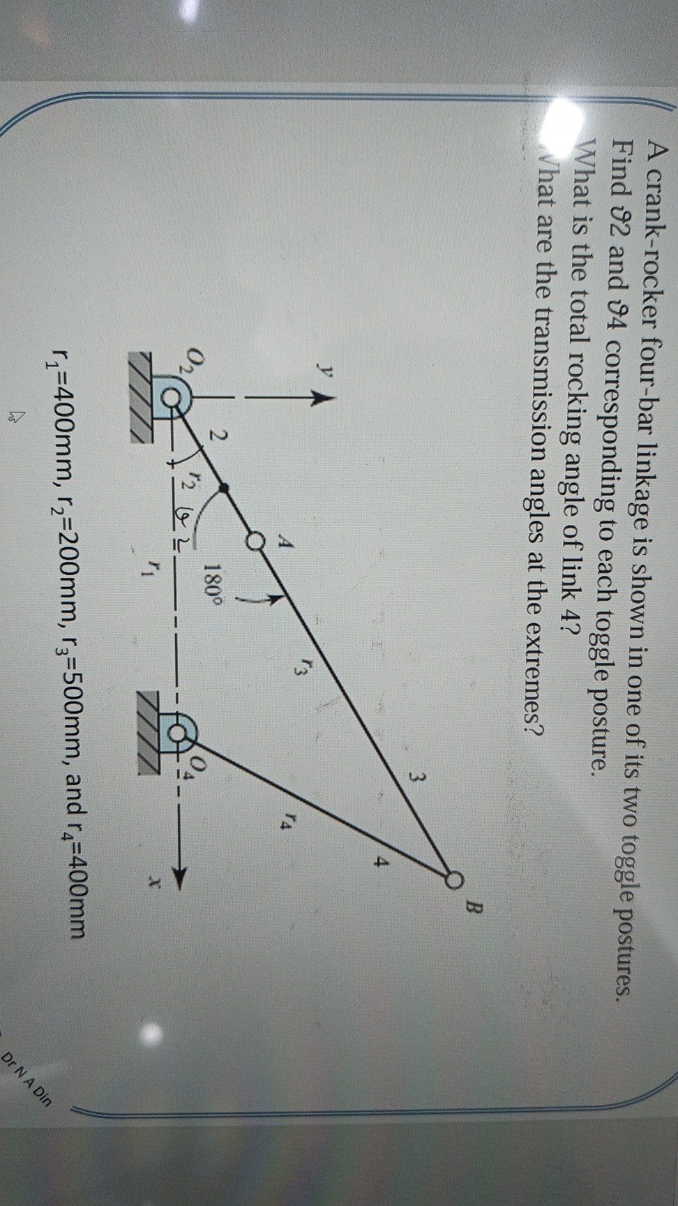 A crank-rocker four-bar linkage is shown in one of its two toggle ...
