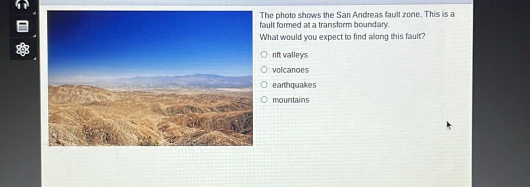 The photo shows the San Andreas fault zone. This is a fault formed at a ...