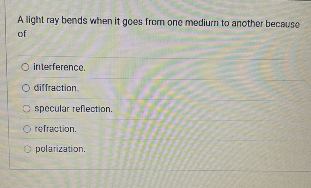 A light ray bends when it goes from one medium to another because of ...