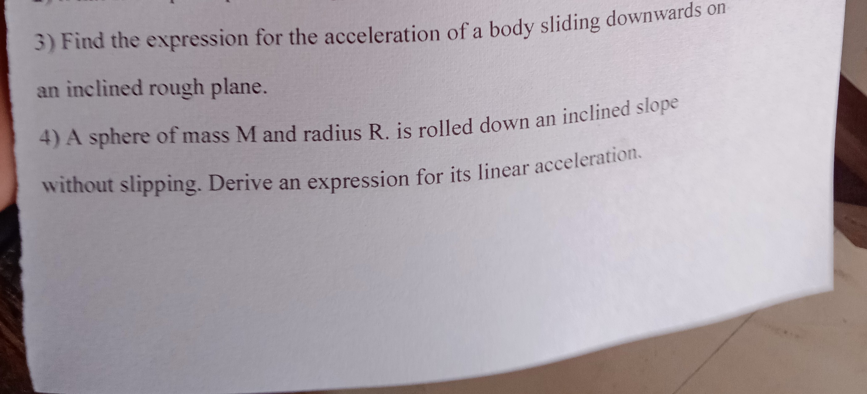 3) Find the expression for the acceleration of a body sliding downwards ...