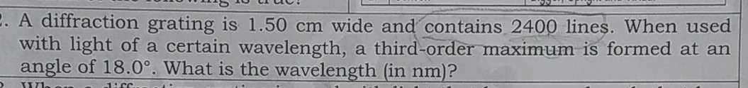 A diffraction grating is 1.50 cm wide and contains 2400 lines. When ...