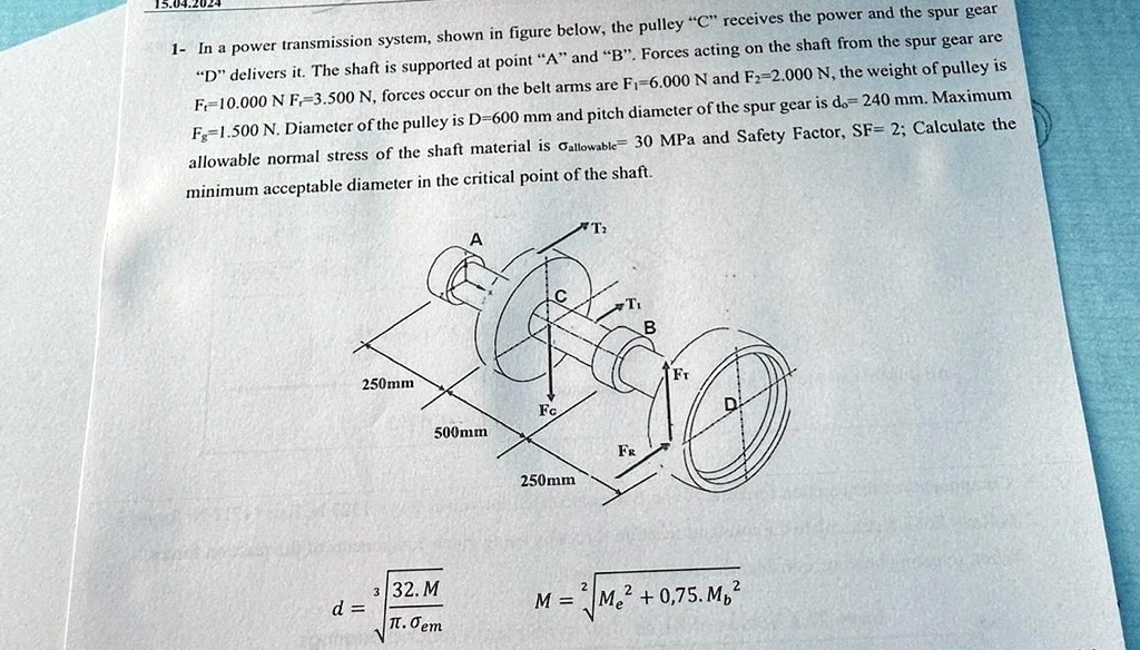 1 in a power transmission system shown in figure below the pulley c ...