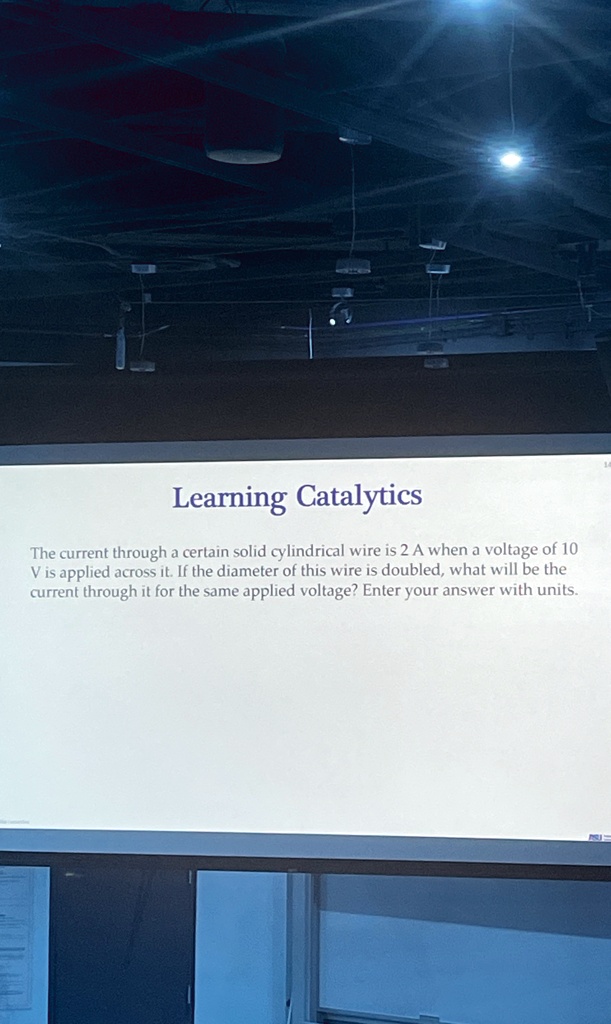 Learning Catalytics The current through a certain solid cylindrical wire is 2 A when a voltage ...