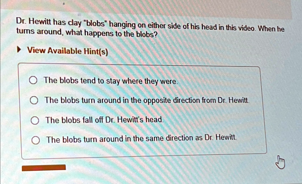 Dr. Hewitt has clay "blobs" hanging on either side of his head in this ...