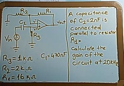 SOLVED: A capacitance of C2=2nF is connected parallel to resistor R1. Calculate the gain of the ...