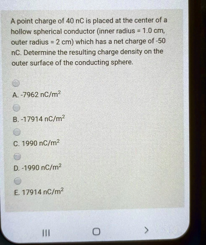 SOLVED: A point charge of 40 nC is placed at the center of a hollow ...