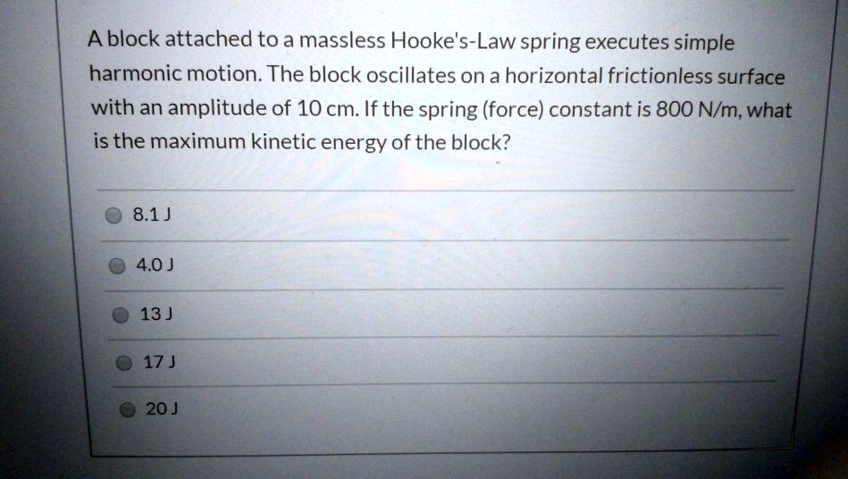 SOLVED: A block attached to a massless Hooke's Law spring executes ...